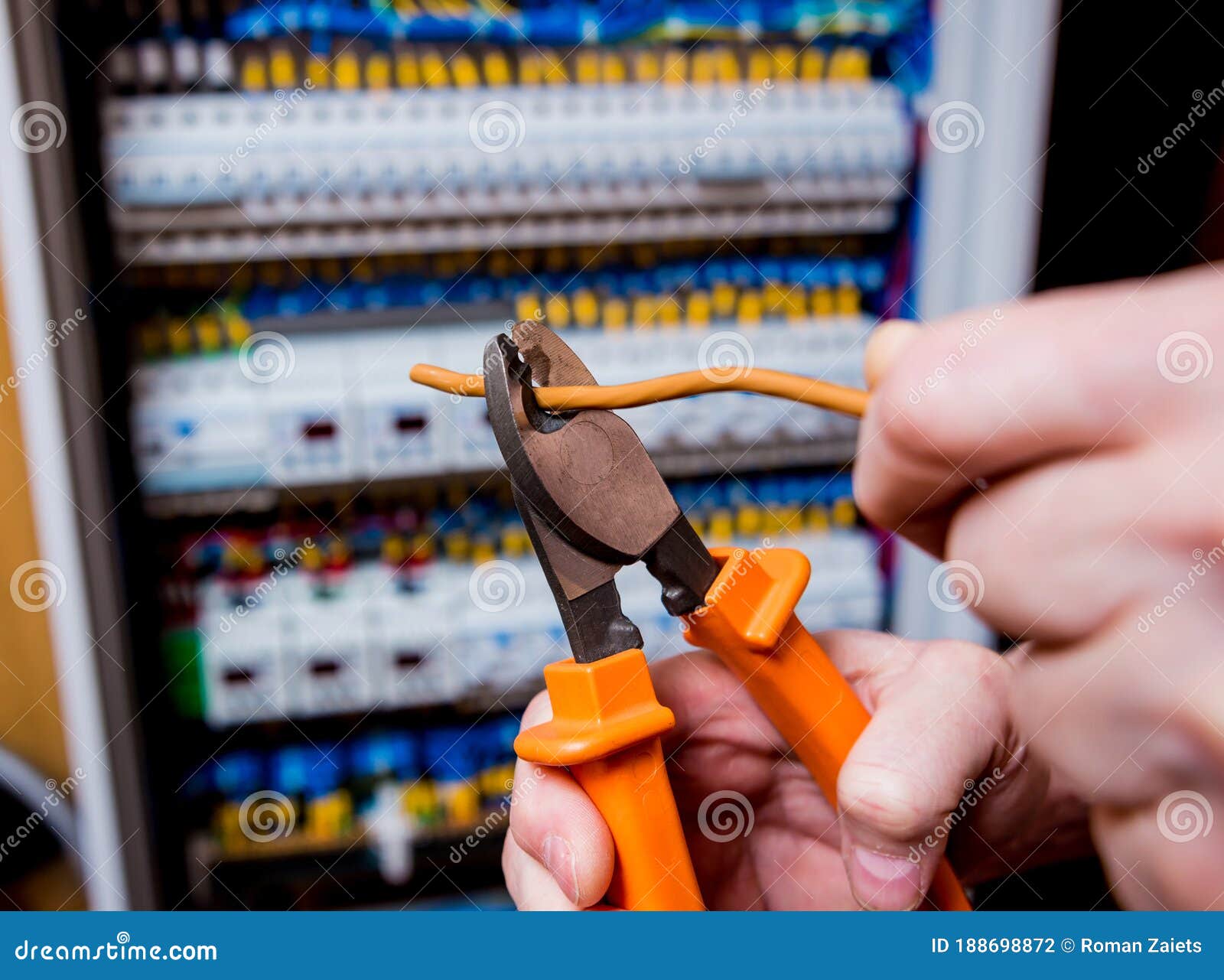 The Man is Repairing the Switchboard Voltage with Automatic Switches ...