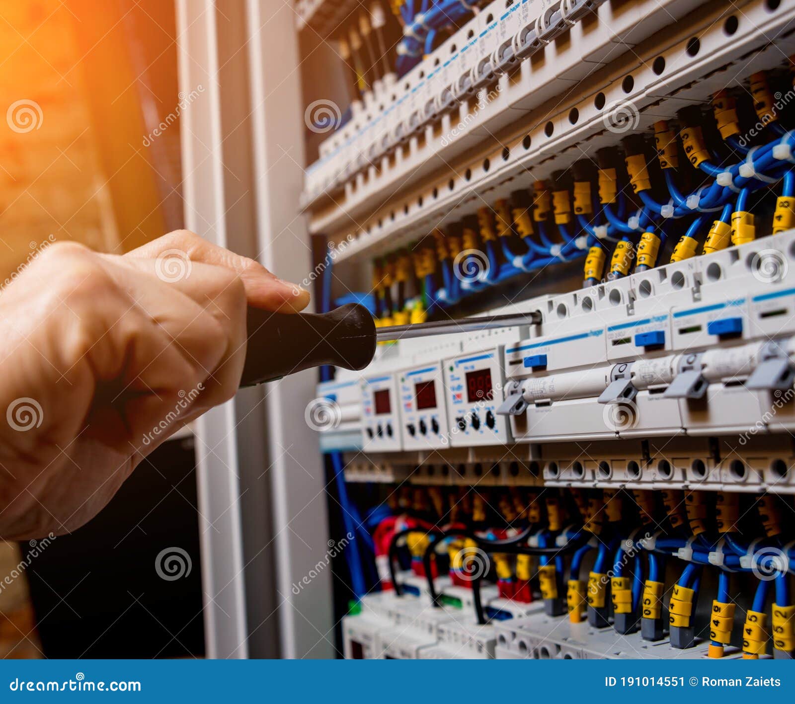 The Man is Repairing the Switchboard Voltage with Automatic Switches ...