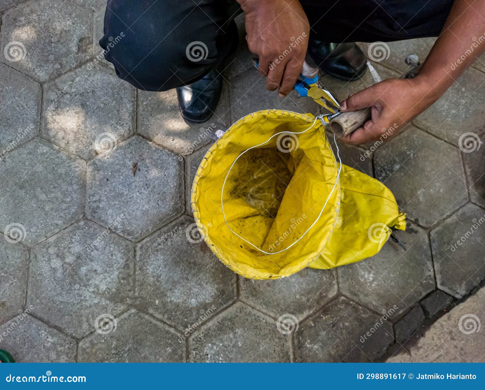 Man is Repairing a Tool To Pick Mango Fruit from a Tree Stock Image ...
