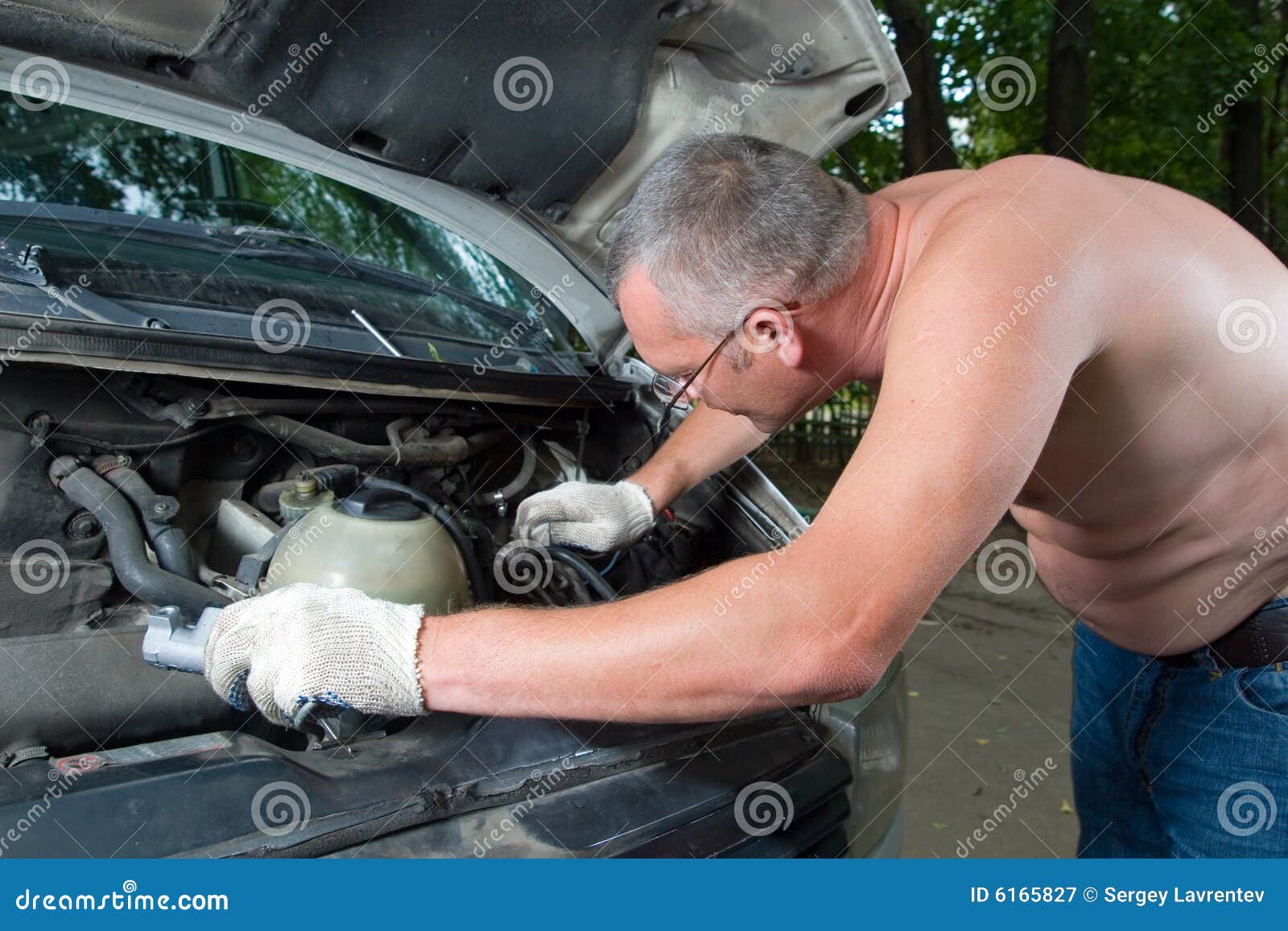 The man repairs car stock image. Image of repair, worker - 6165827