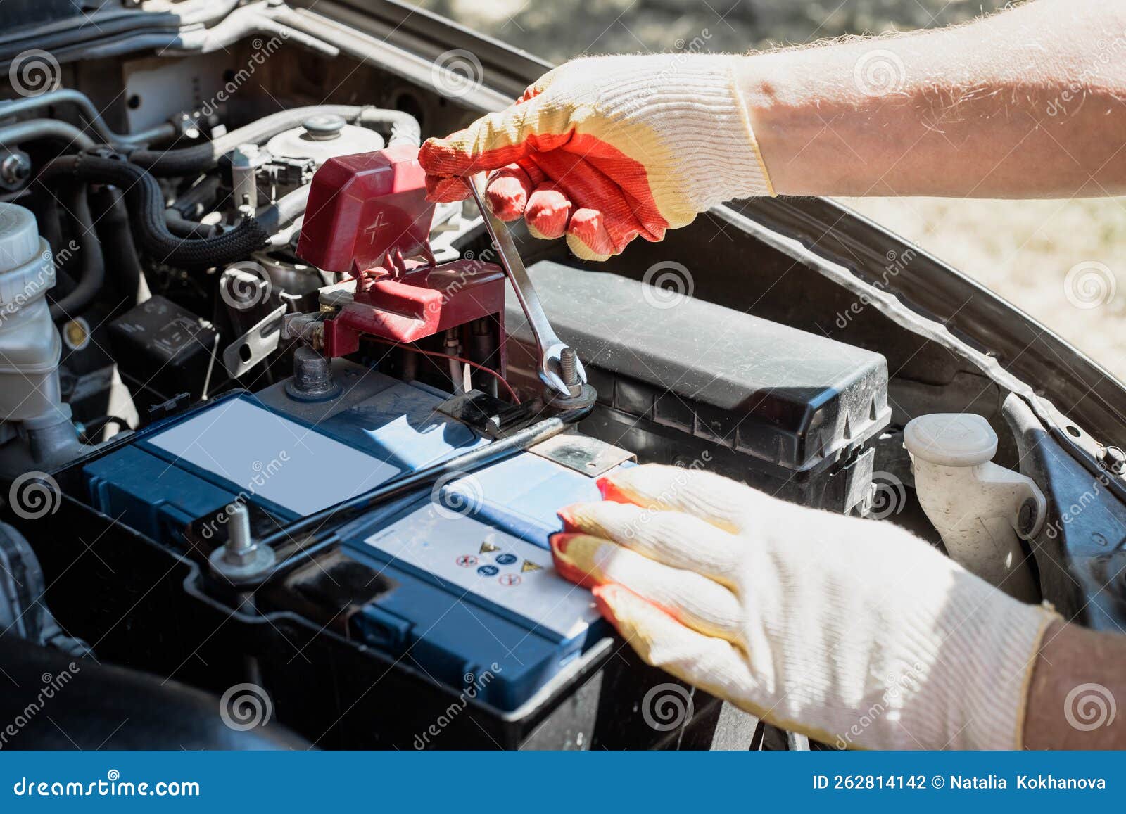 Man Repairs a Car. Removing the Car Battery Stock Photo - Image of ...