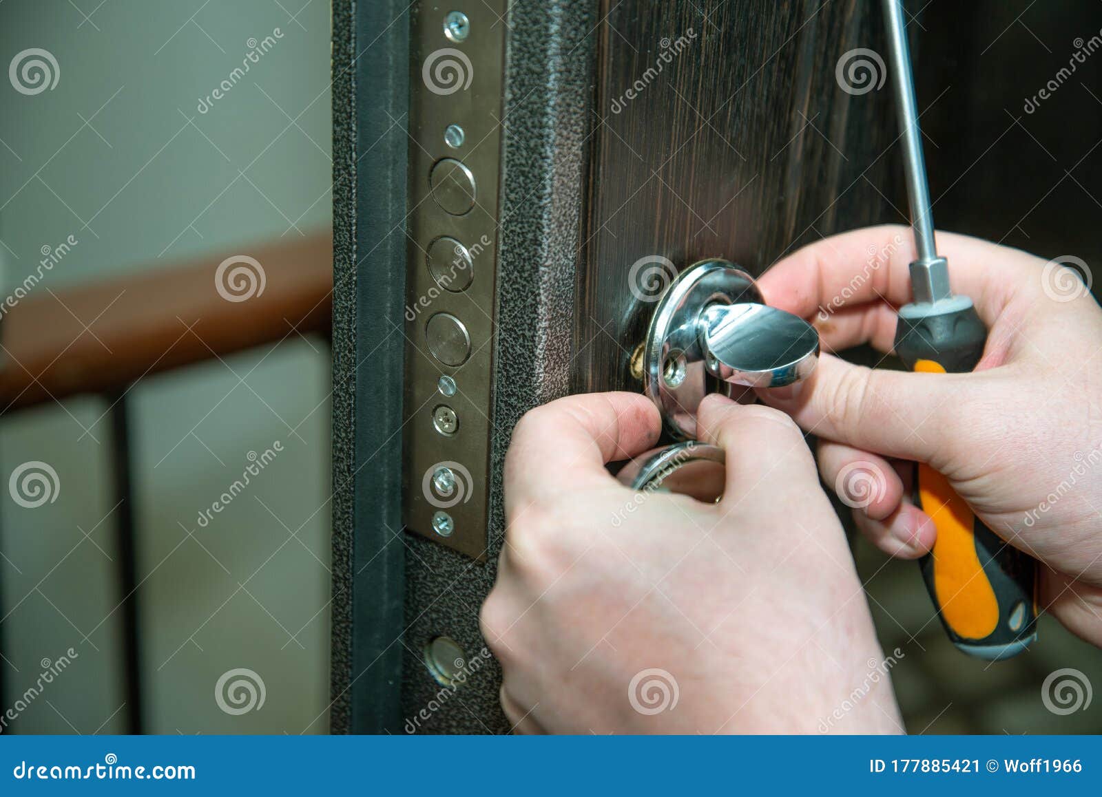A Man Repairs a Door Lock. Close-up Stock Image - Image of professional ...