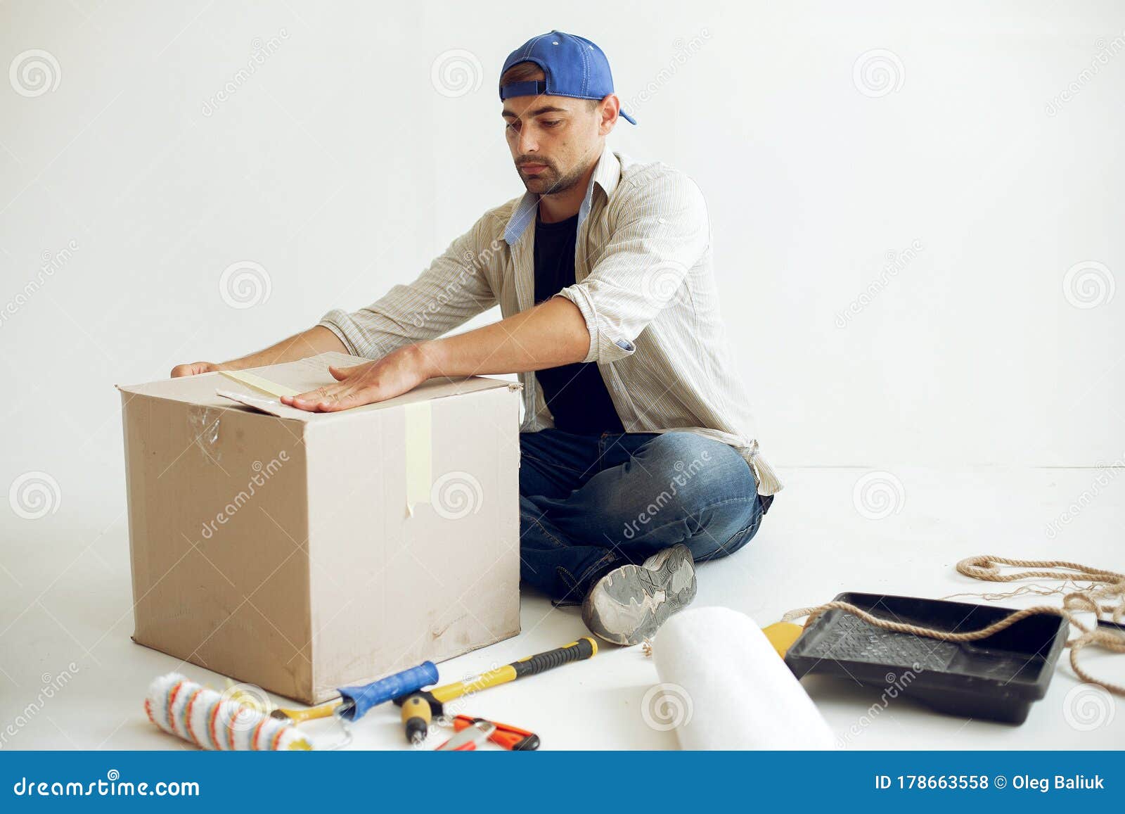 The Handsome Man Repairs the Room Stock Photo - Image of lifestyle ...