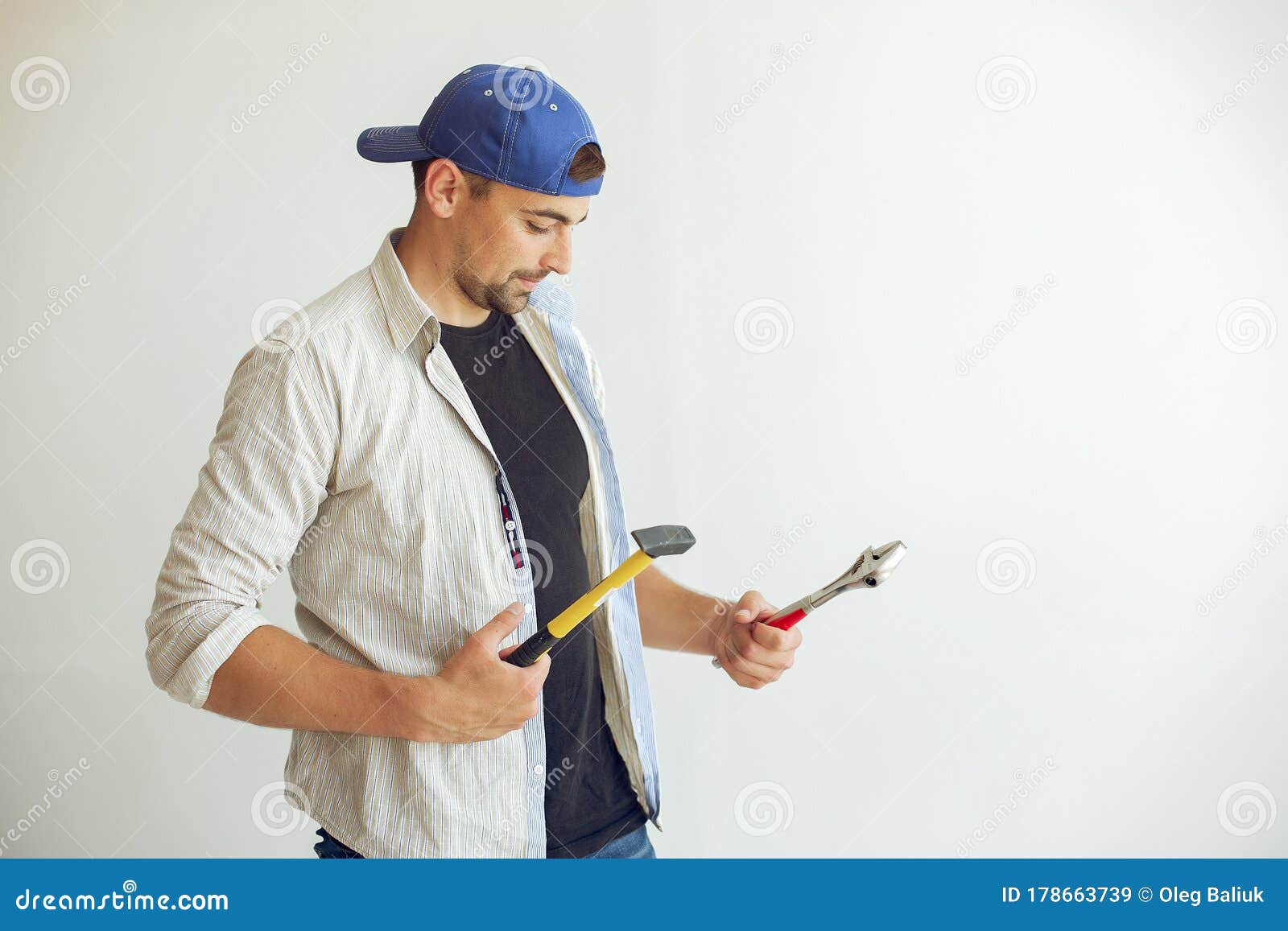 The Handsome Man Repairs the Room Stock Image - Image of home, happy ...