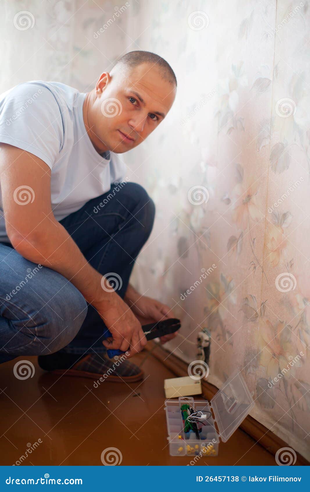 Man repairs the socket stock photo. Image of equipment - 26457138