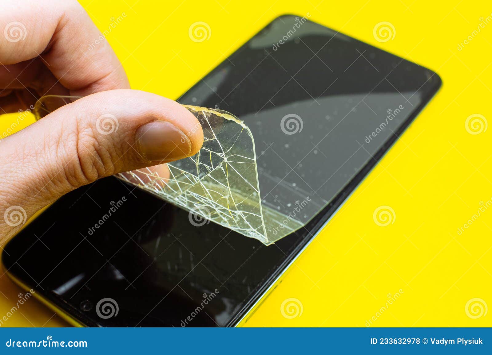 Man Replacing the Broken Tempered Glass Screen Protector. Crashed ...