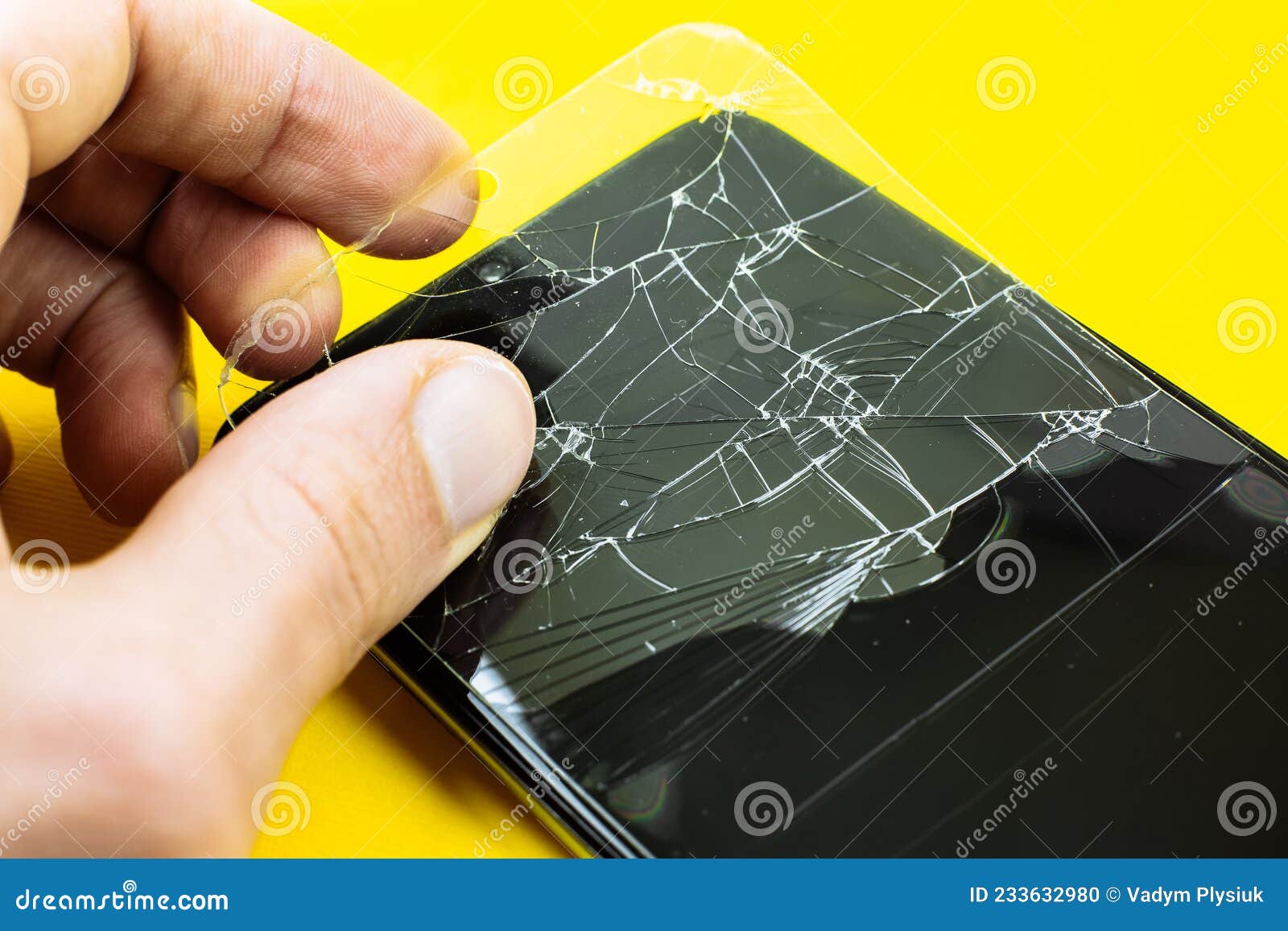 Man Replacing the Broken Tempered Glass Screen Protector. Crashed ...