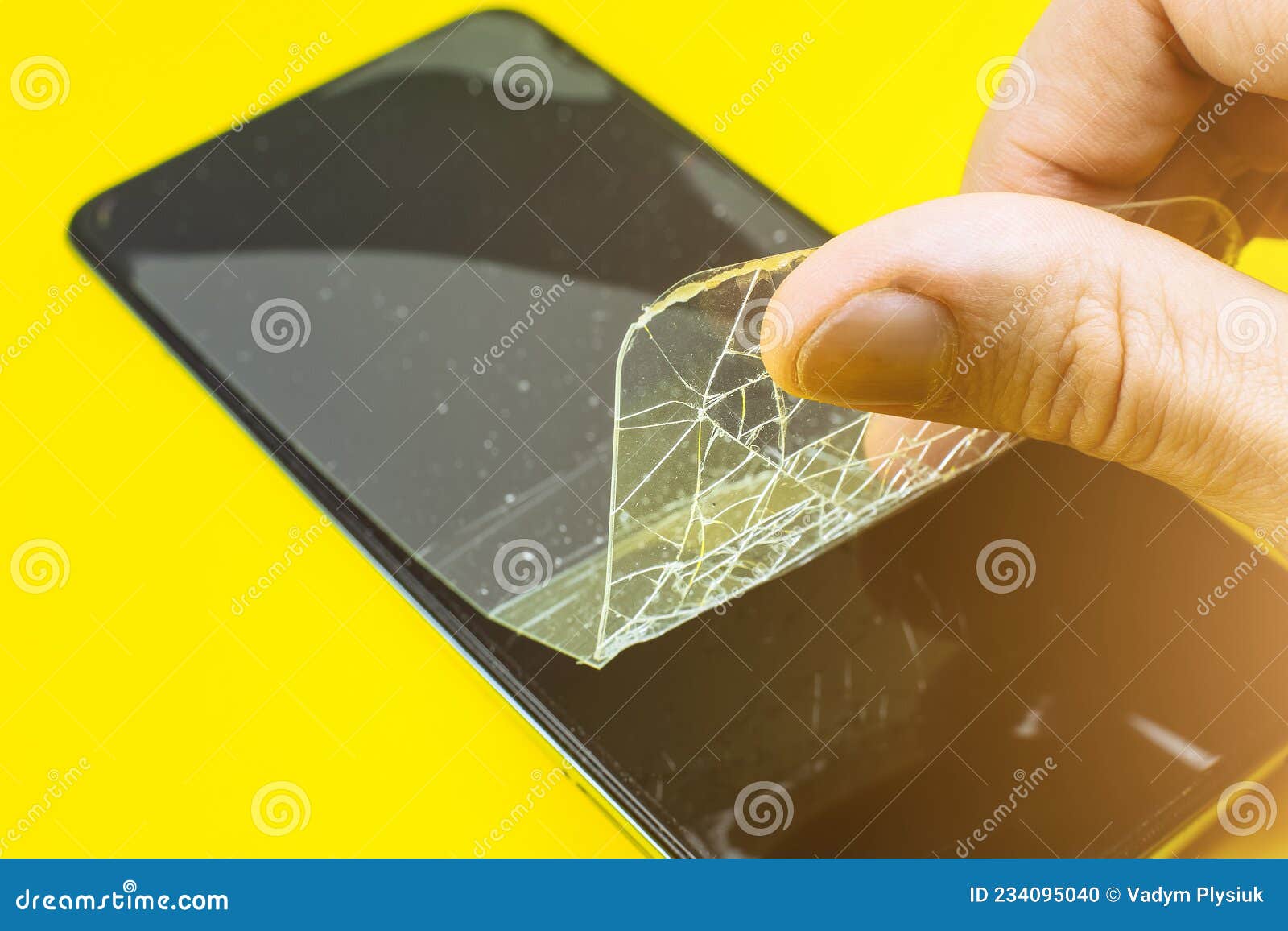 Man Replacing the Broken Tempered Glass Screen Protector. Crashed ...