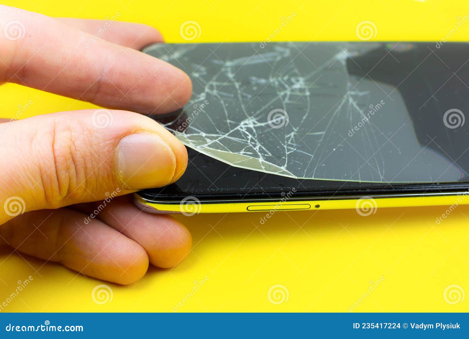 Man Replacing the Broken Tempered Glass Screen Protector. Crashed ...