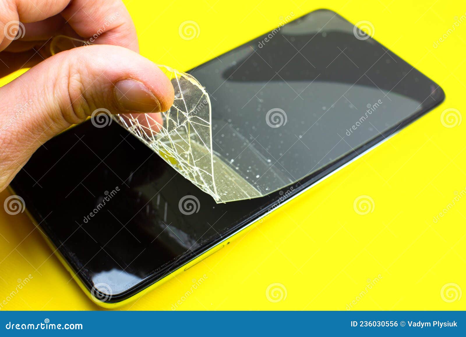 Man Replacing the Broken Tempered Glass Screen Protector. Crashed ...