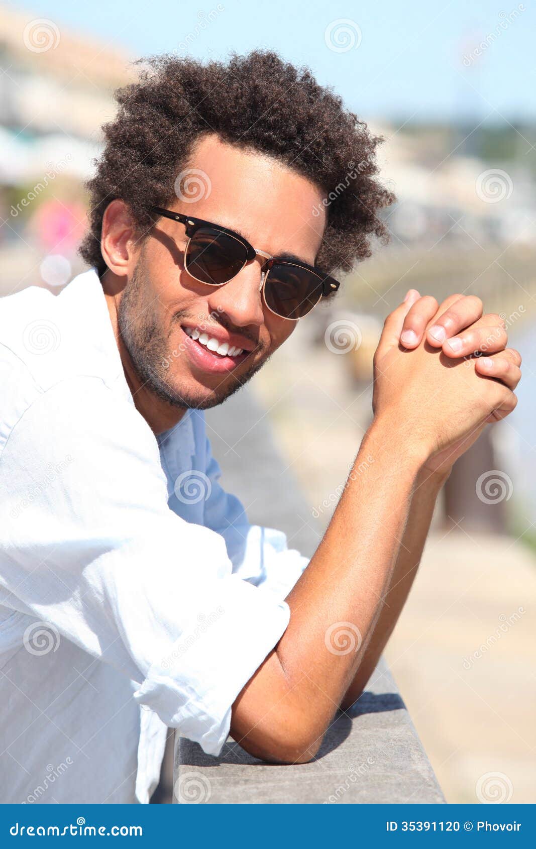 Man reposing on a wharf stock photo. Image of metis, luminous - 35391120