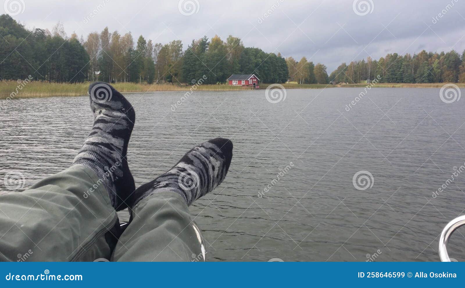 A Man Resting on the Boat Legs Lake Stock Image - Image of resting ...