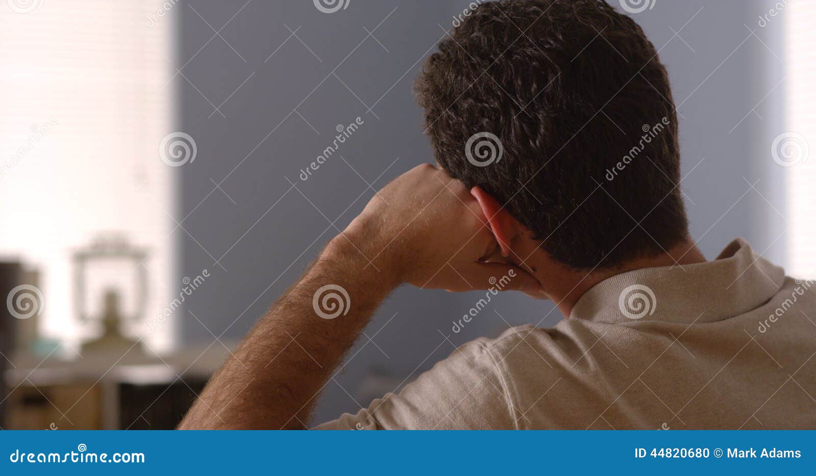 Man Resting on Hand in Living Room Stock Photo - Image of relaxation ...