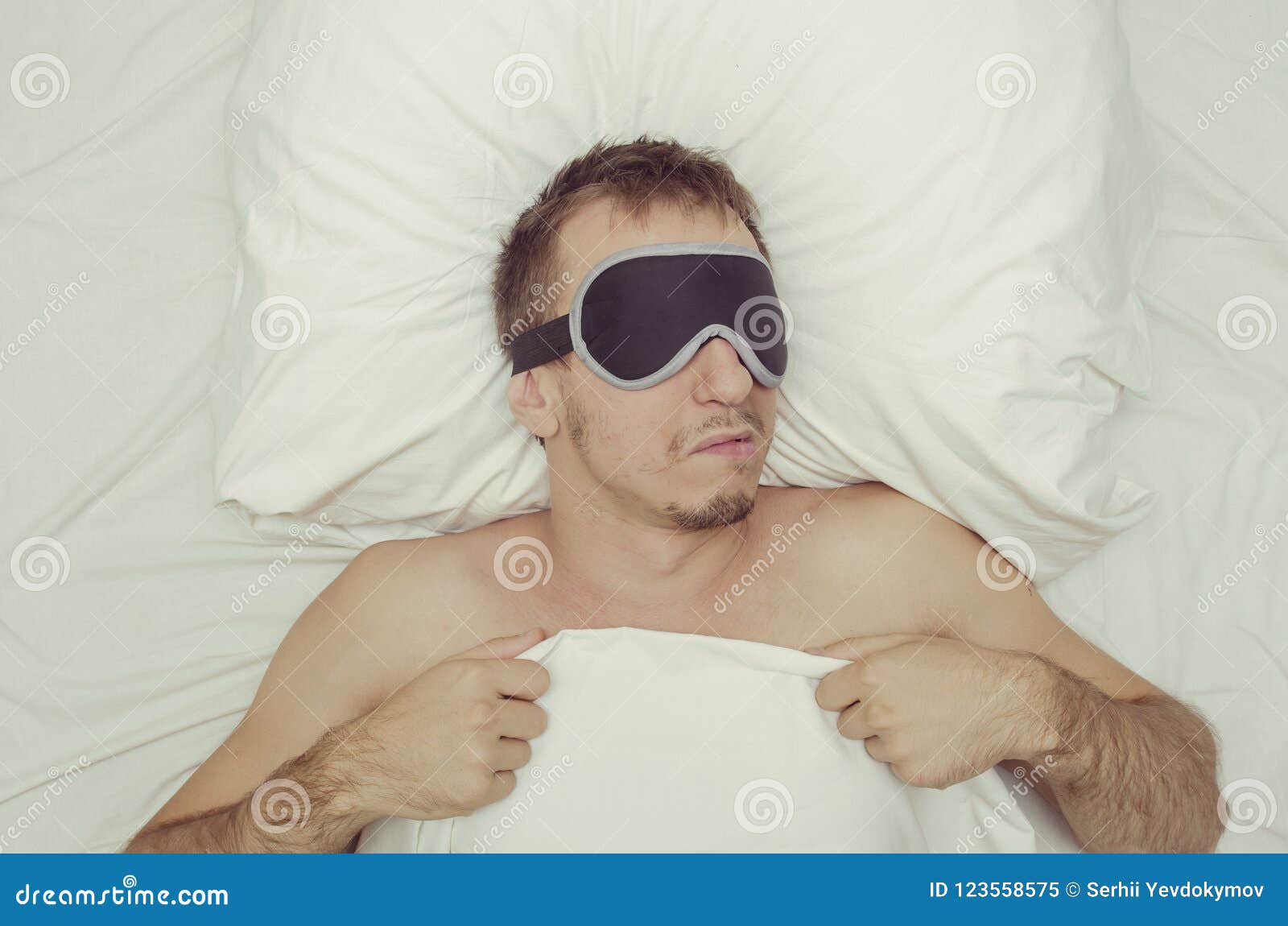 Man Resting in a Mask for Sleep. Stubble on His Face Stock Image ...