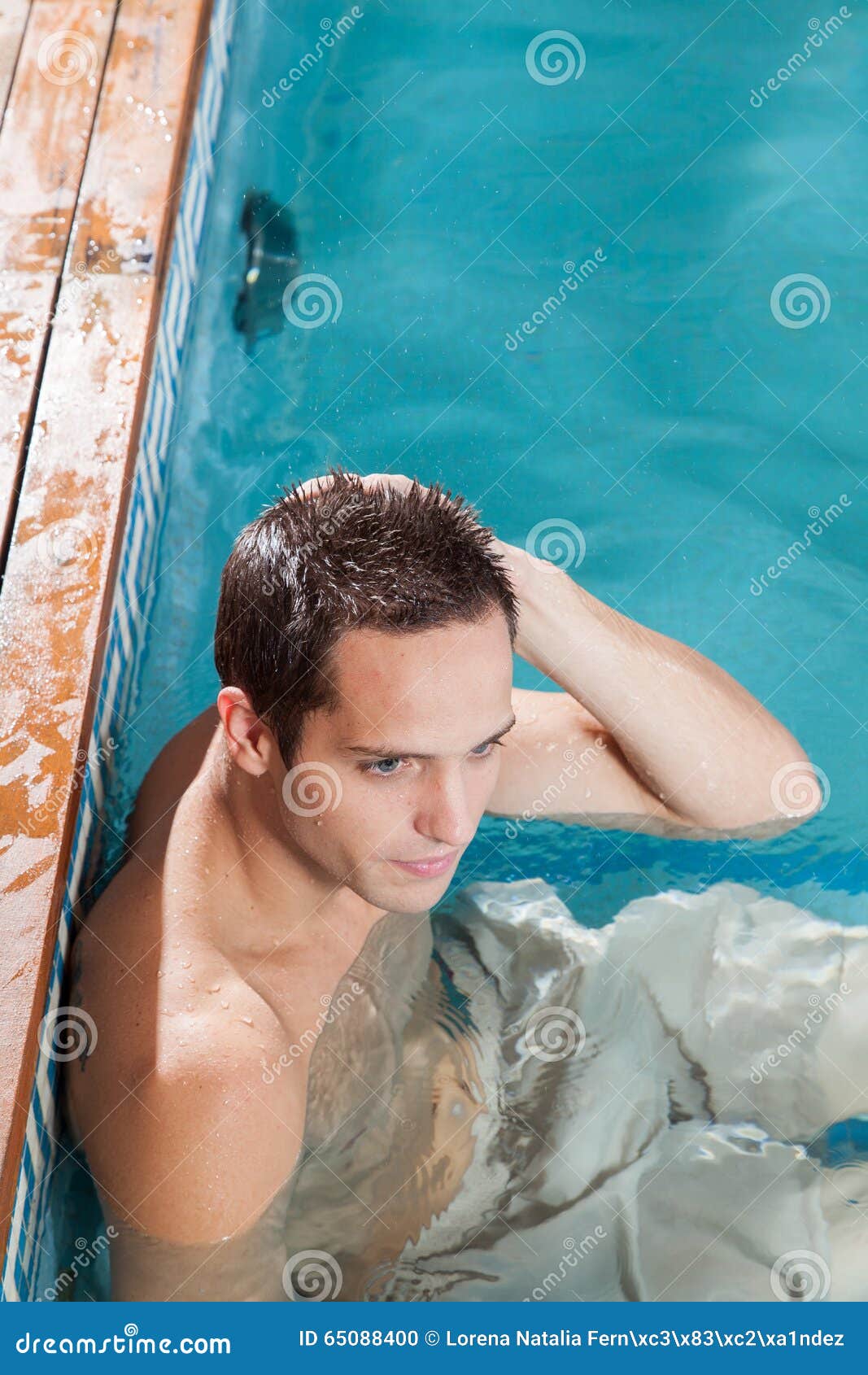 Man resting in the pool stock photo. Image of adult, model - 65088400
