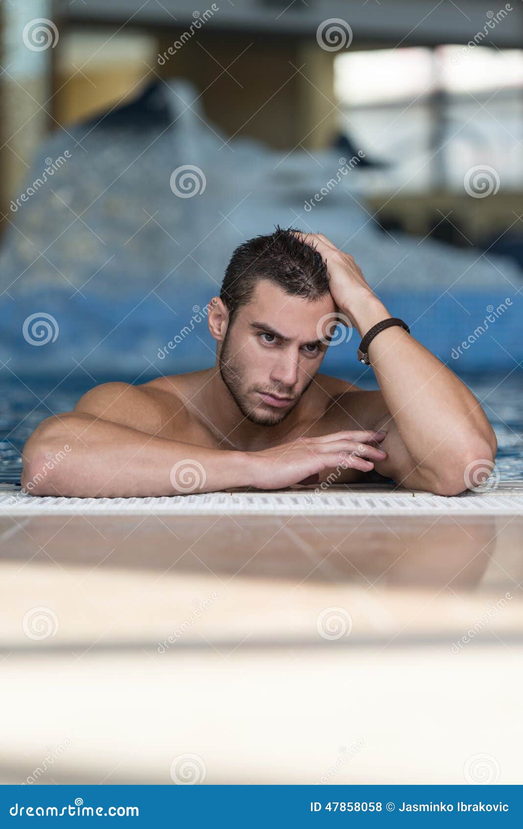 Man Resting Relaxed on Edge of Swimming Pool Stock Photo - Image of ...