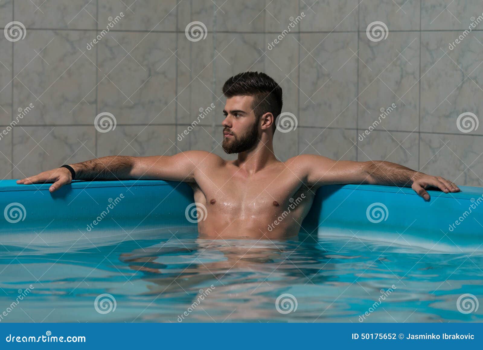 Man Resting Relaxed on Edge of Swimming Pool Stock Photo - Image of ...