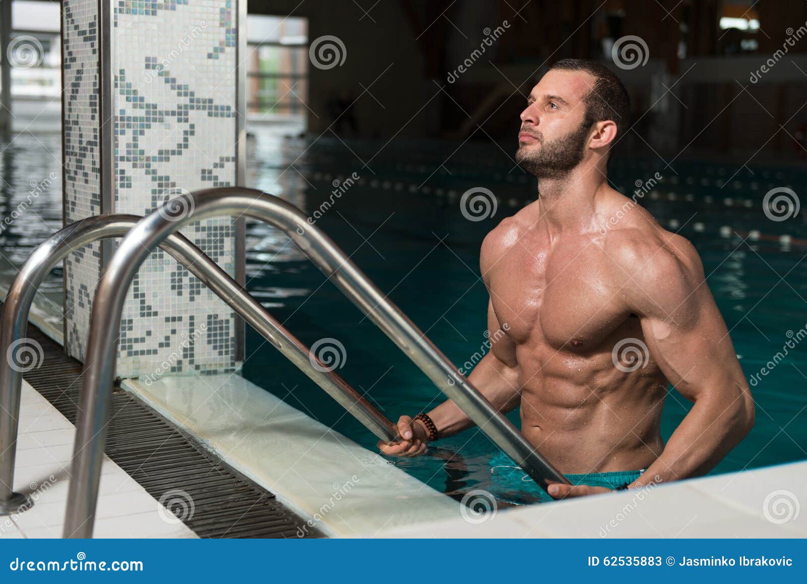 Man Resting Relaxed on Edge of Swimming Pool Stock Image - Image of ...