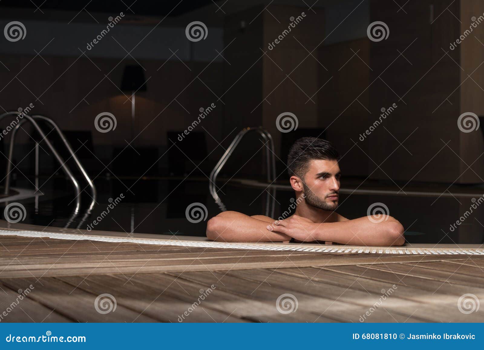 Man Resting Relaxed on Edge of Swimming Pool Stock Photo - Image of ...