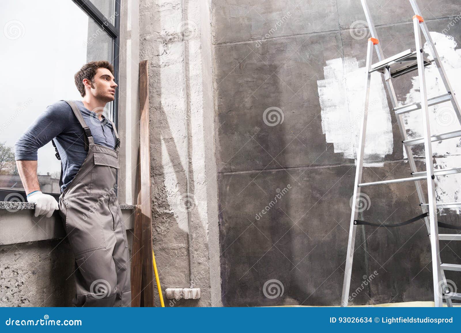 Man Resting while Renovating Home, Renovation Home Concept Stock Photo ...