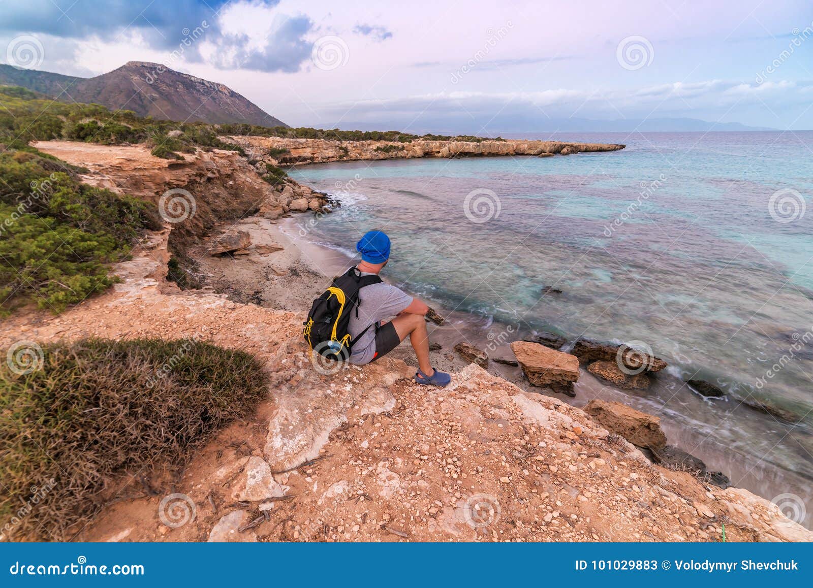 A man resting on a rock stock image. Image of peaceful - 101029883