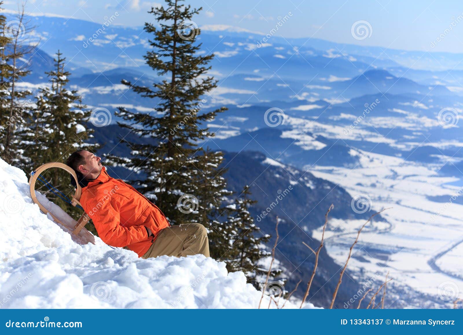 Man resting in the snow stock image. Image of caucasian - 13343137