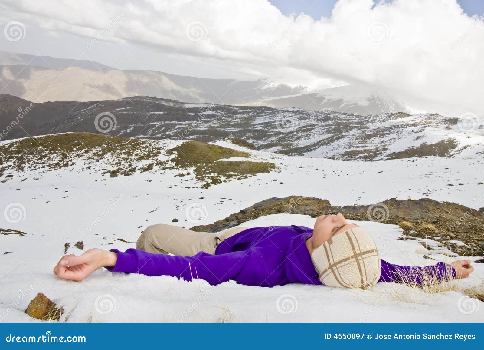 Man resting in the snow stock image. Image of scene, clothing - 4550097