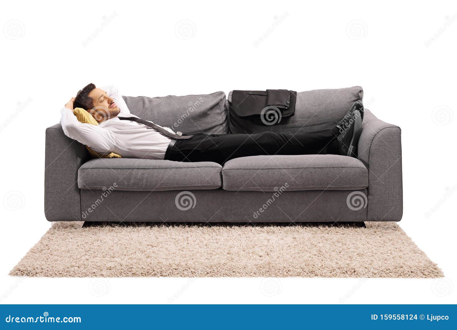Man Resting on a Sofa after Work Stock Photo - Image of length, full ...