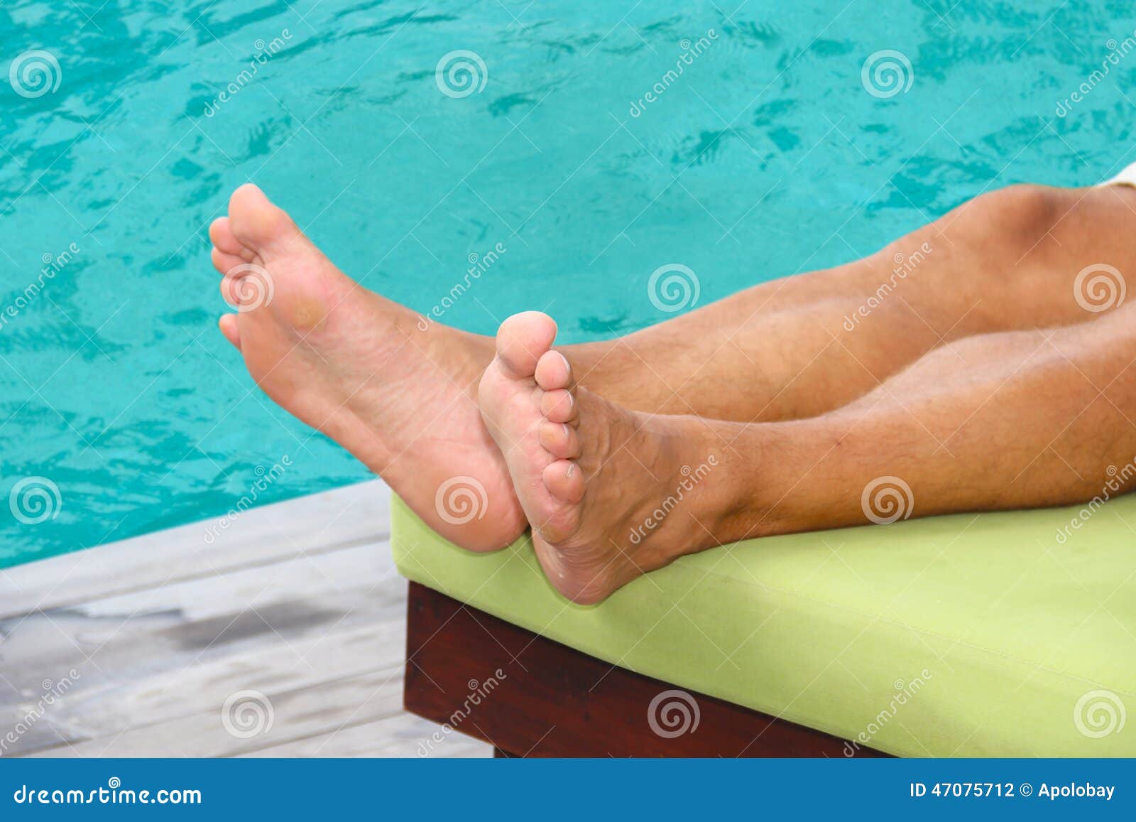 Man is Resting on a Sun Lounger by the Pool Stock Photo - Image of ...