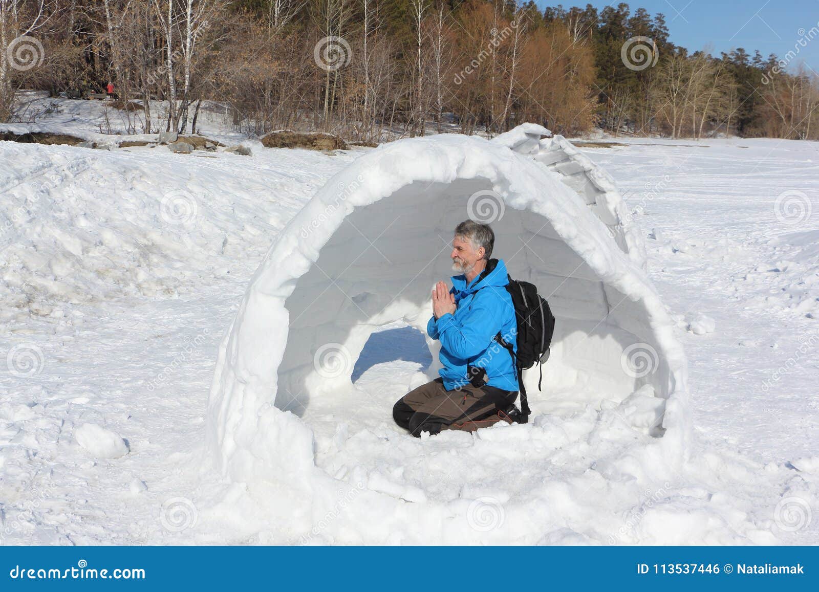 Man Resting in Unfinished an Igloo on a Glade Stock Photo - Image of ...