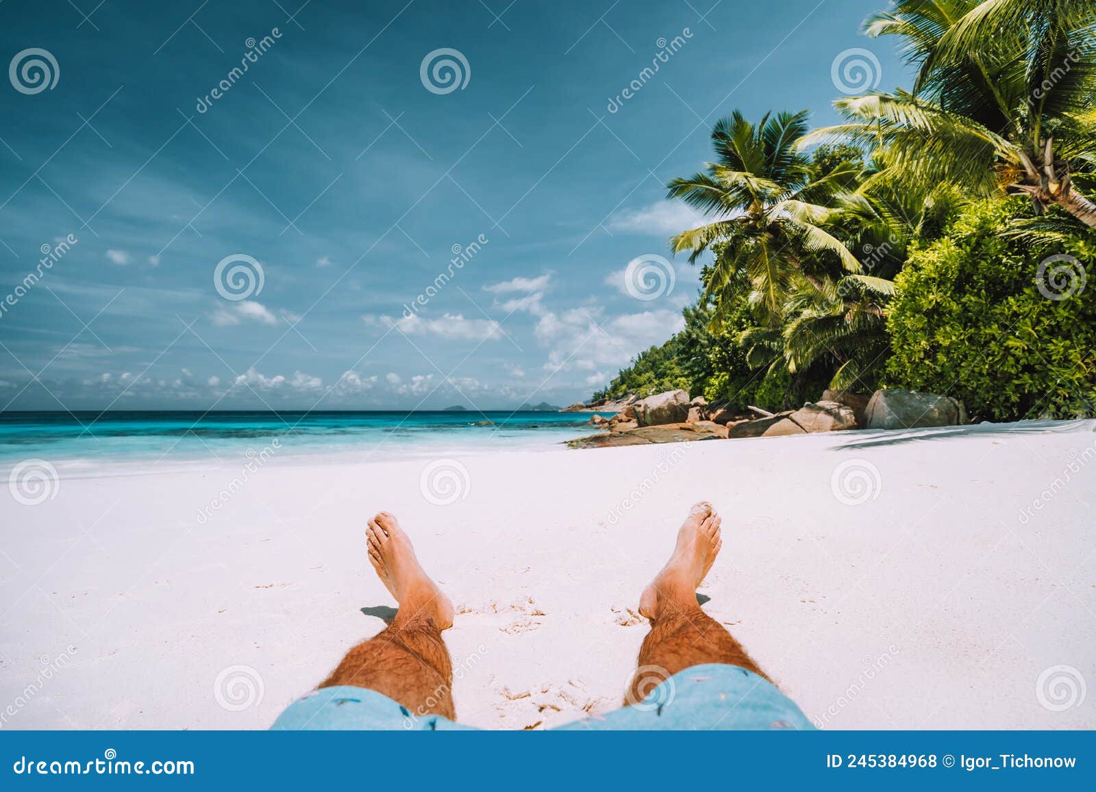 Man Resting on the White Sand Beach with Beautiful Palm Trees Stock ...