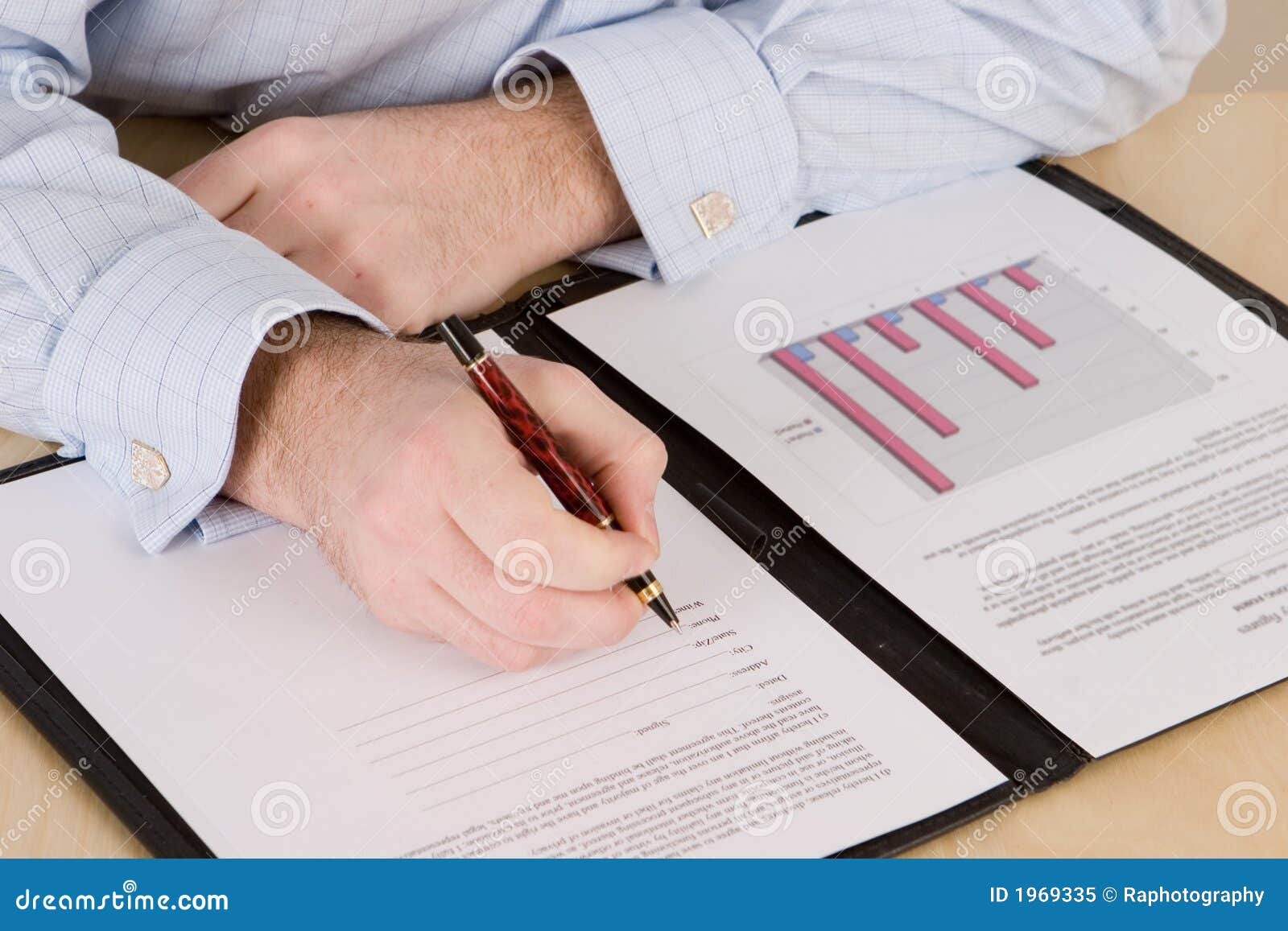 A man reviewing a contract stock image. Image of formal - 1969335