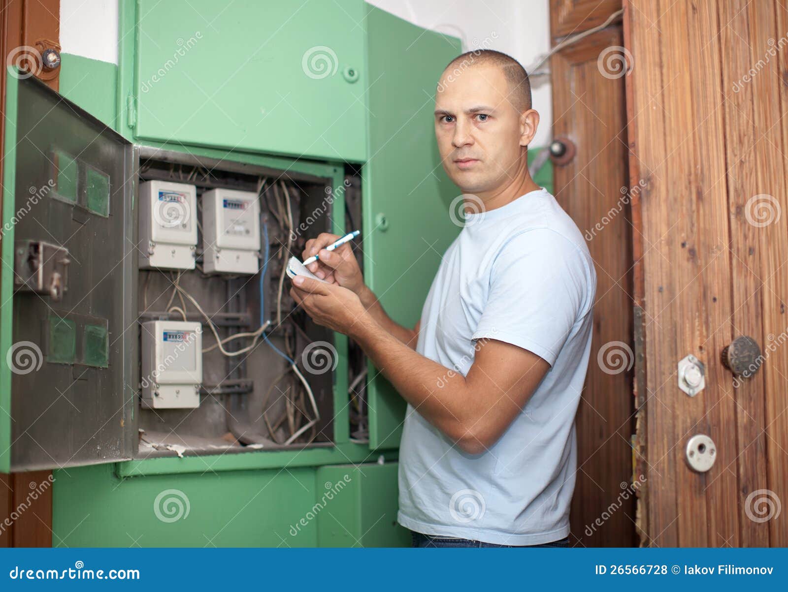 Man Rewrites Electric Power Meter Readings Stock Photo - Image of ...