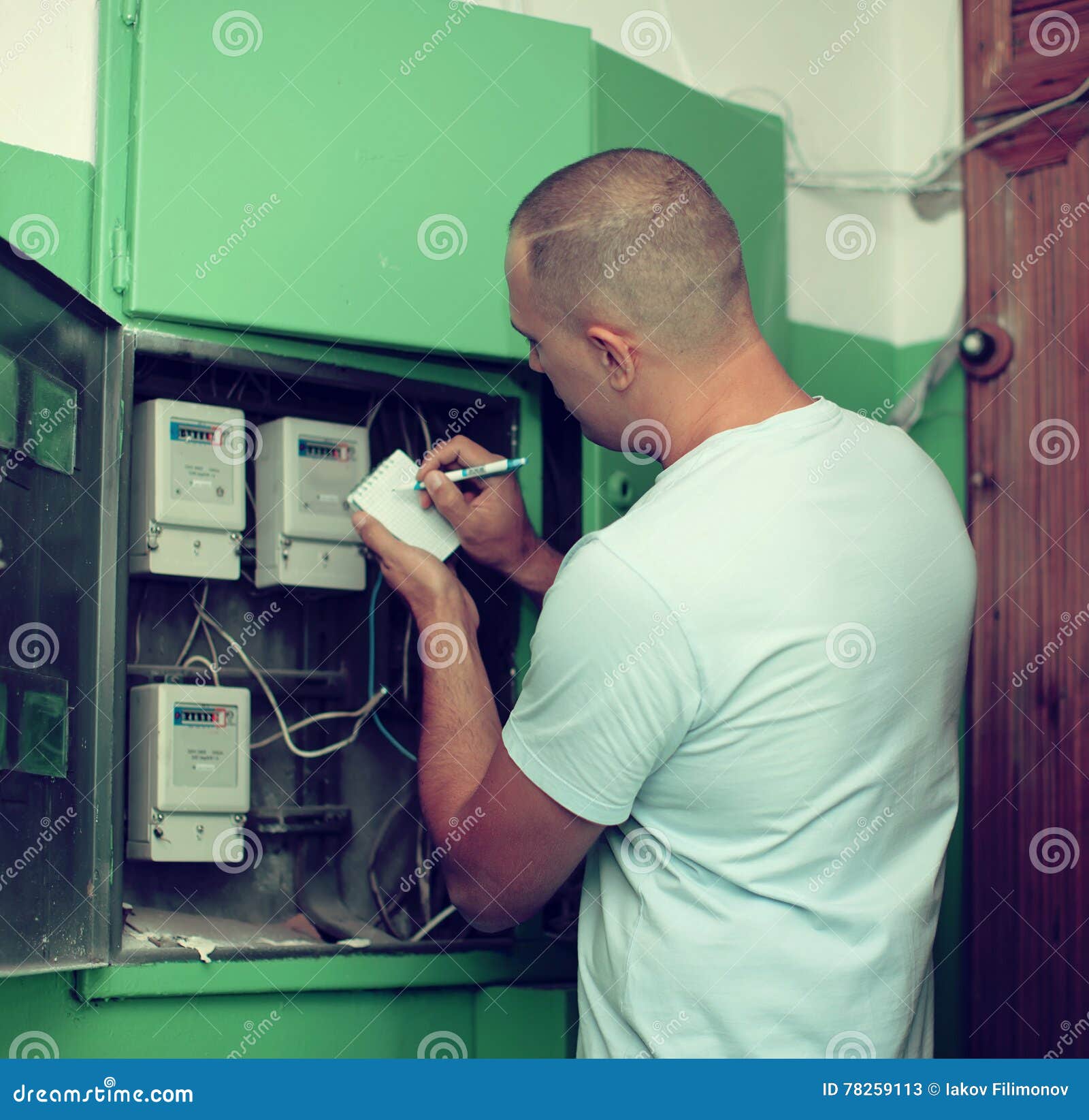 Man Rewrites the Meter Readings Stock Image - Image of industry, home ...