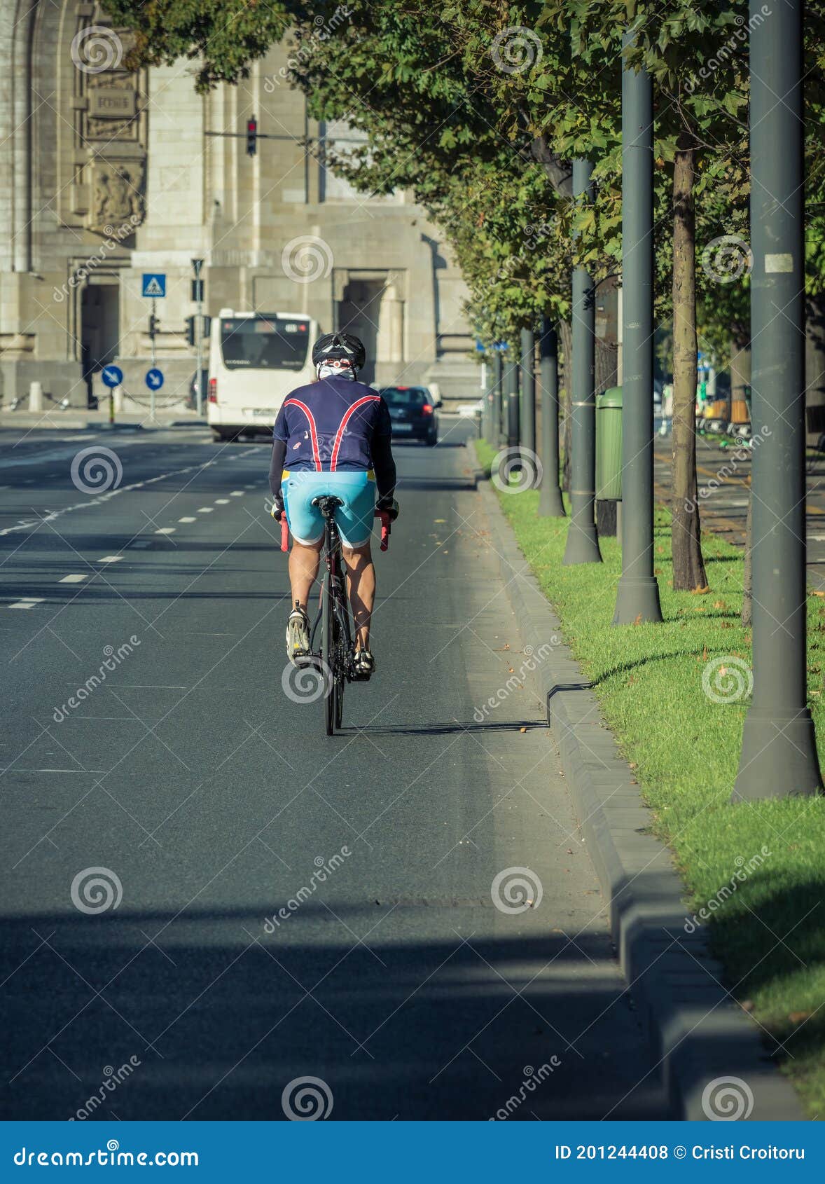 Man Ridding a Bicycle on the Streets of Bucharest Stock Photo - Image ...