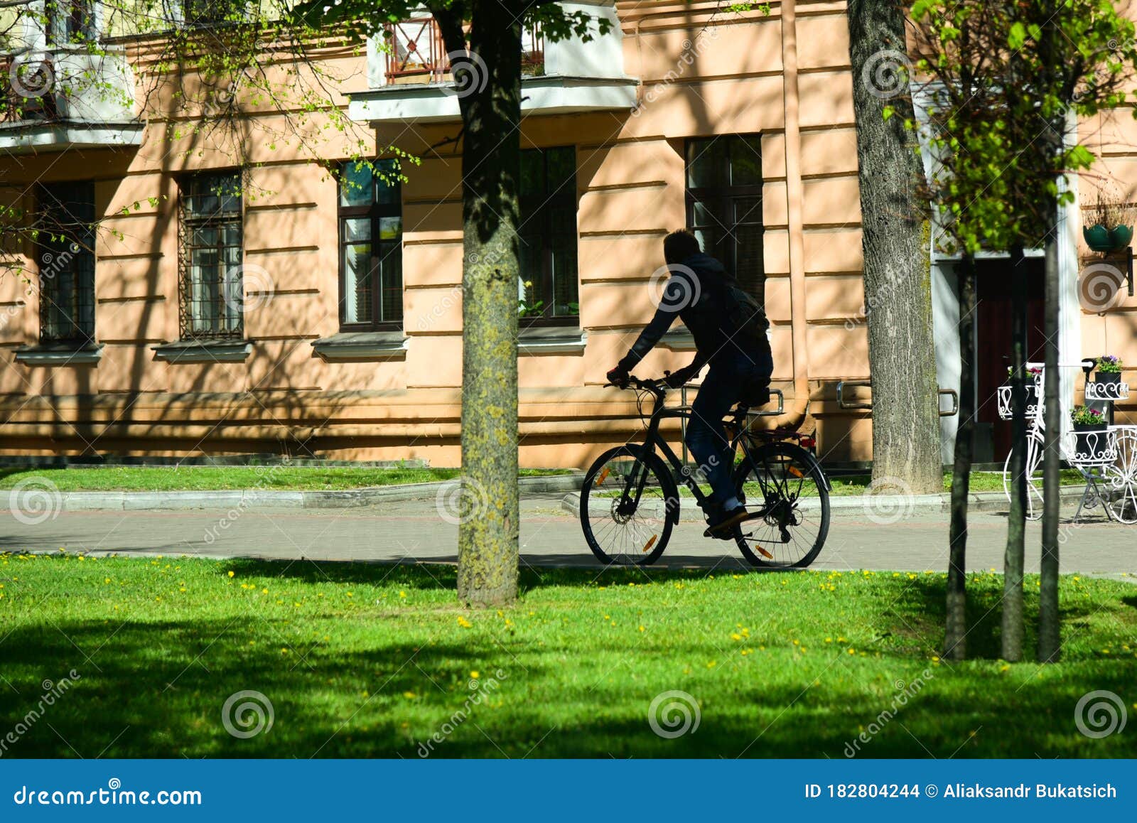 A Man Rides a Bicycle Around the City Stock Photo - Image of weekend ...