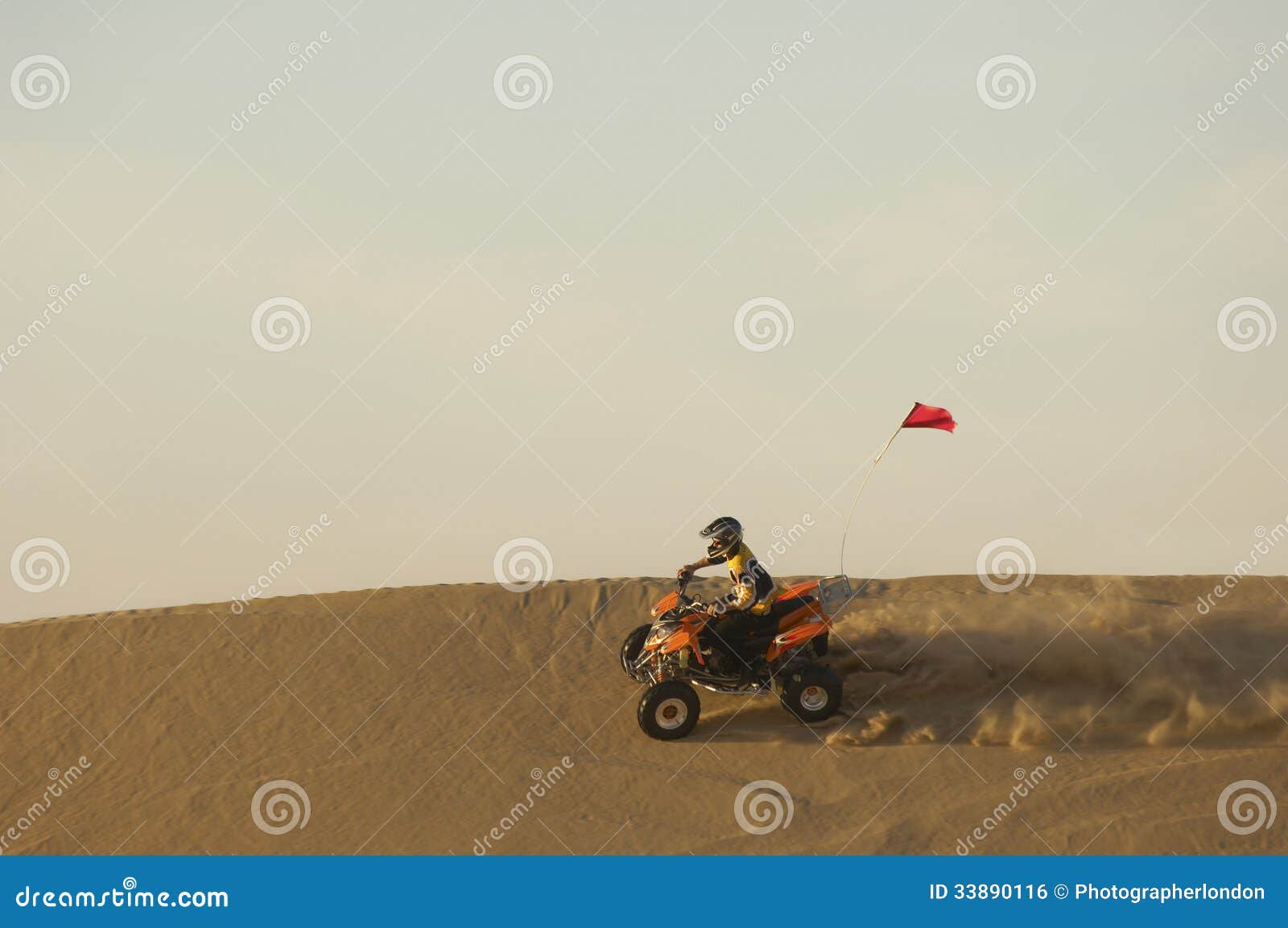 Man Riding Atv in Desert stock photo. Image of motor - 33890116
