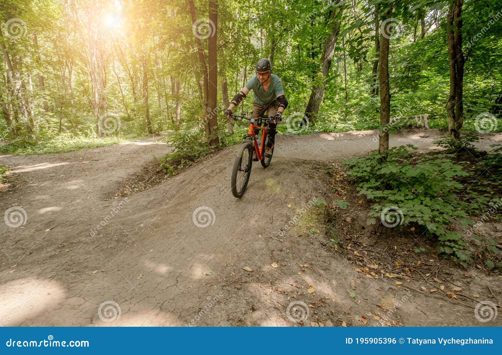 Man Riding Bicycle on Forest Road Stock Photo - Image of activity ...