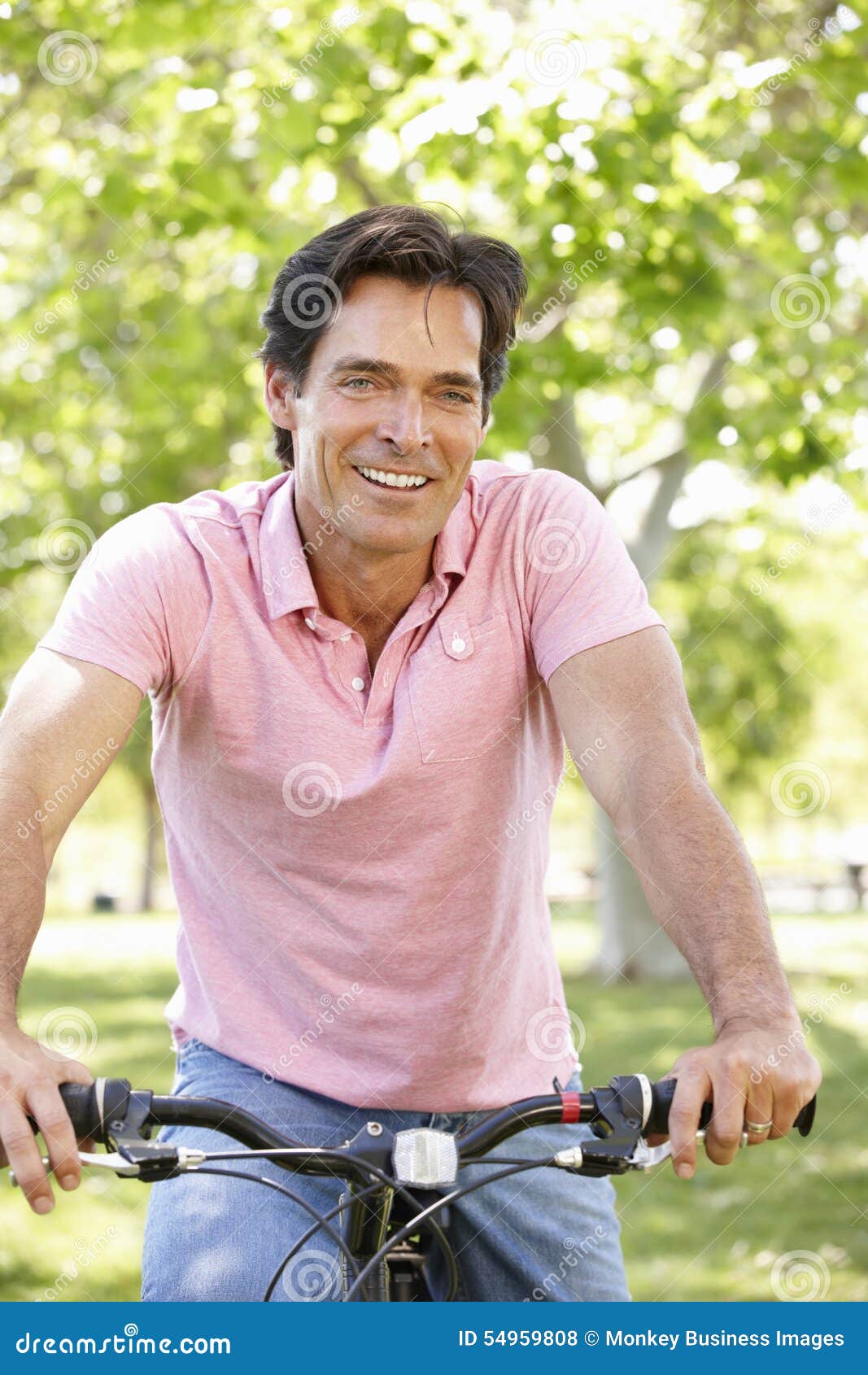 Man riding bike stock photo. Image of outdoors, focus - 54959808