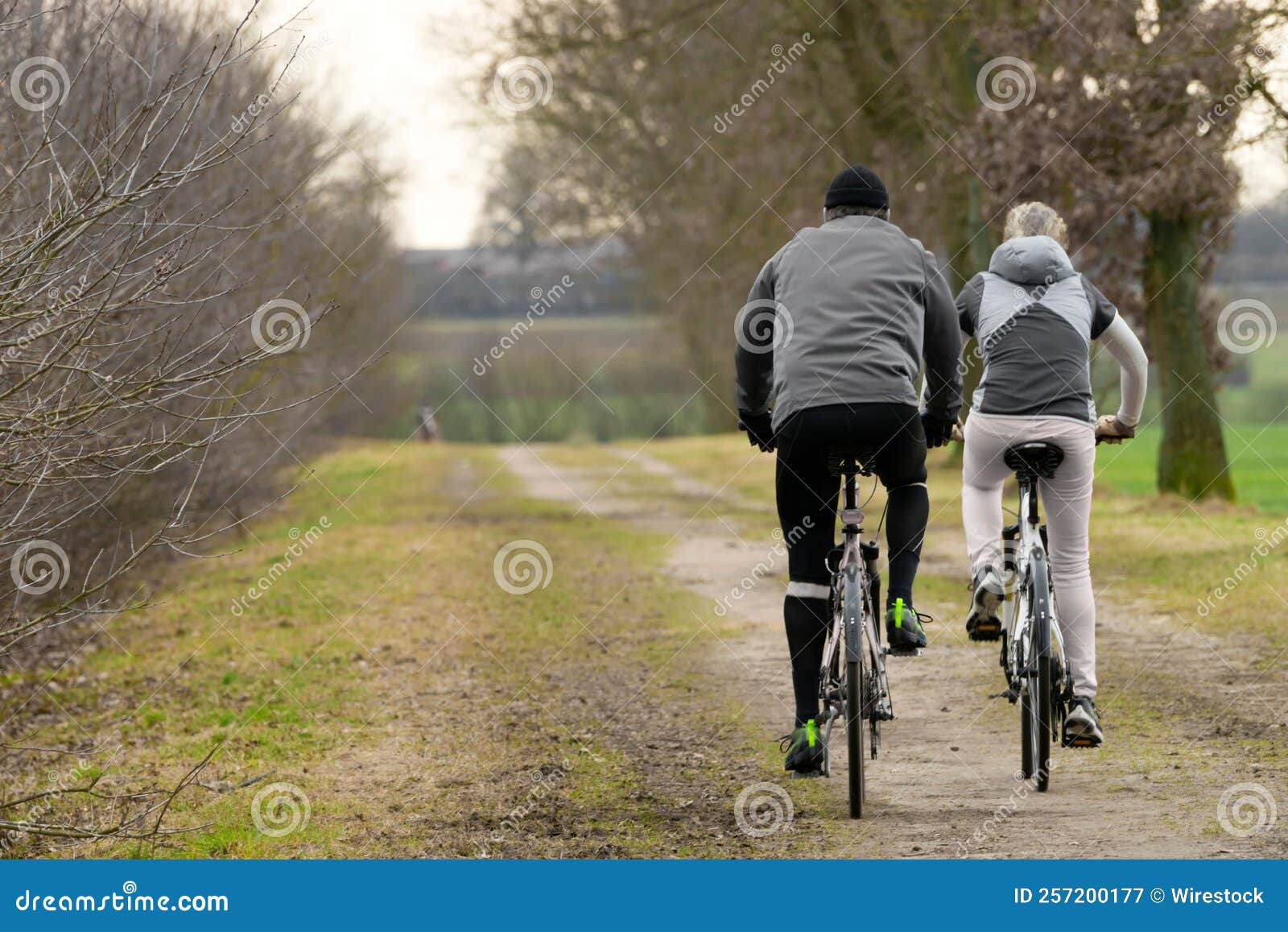 Man riding bikes in nature stock image. Image of people - 257200177