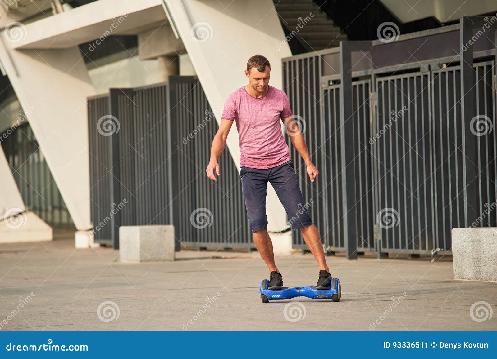 Man riding hoverboard. stock image. Image of control - 93336511