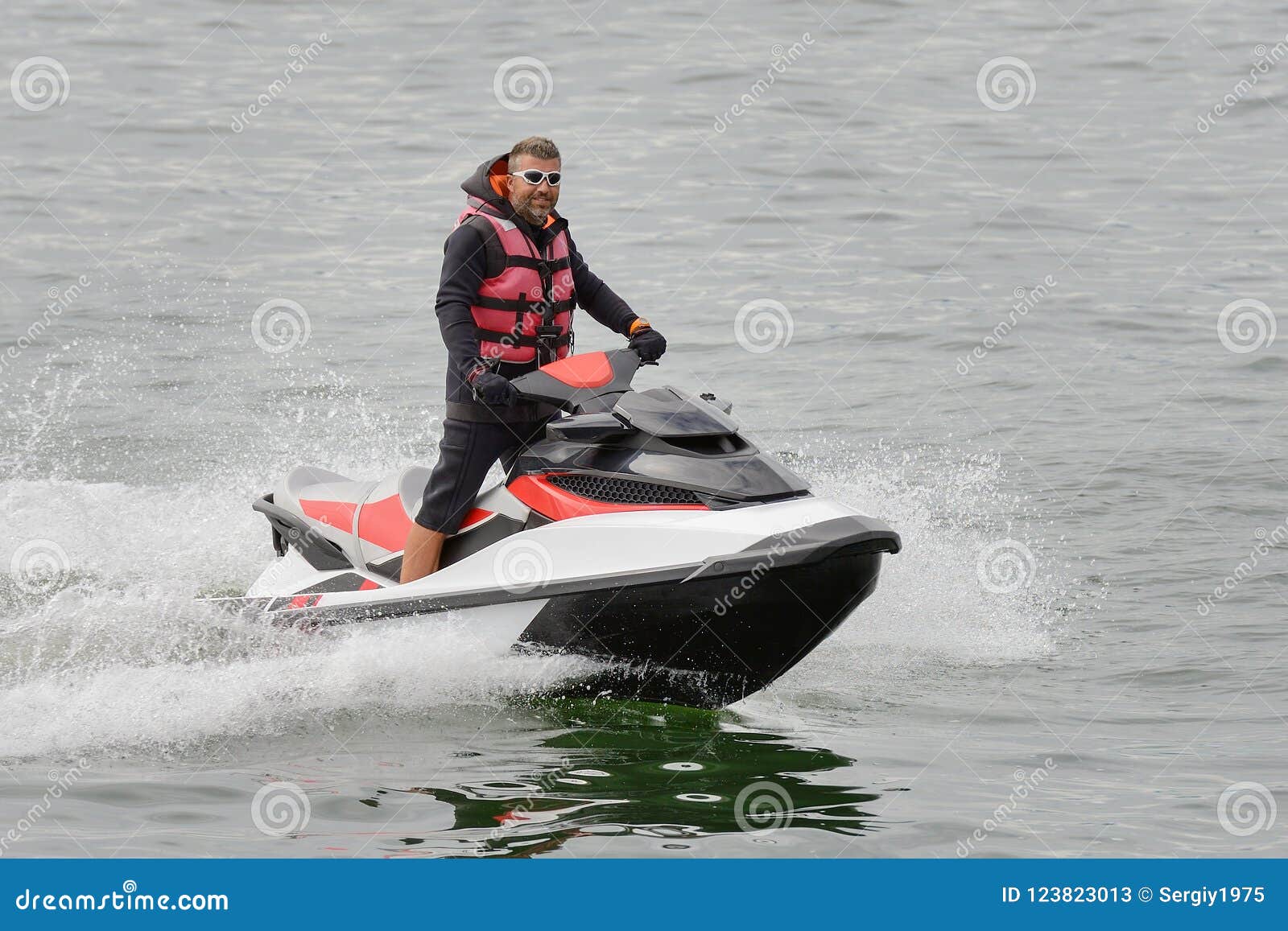 Man riding a jet ski stock image. Image of ride, riding - 123823013