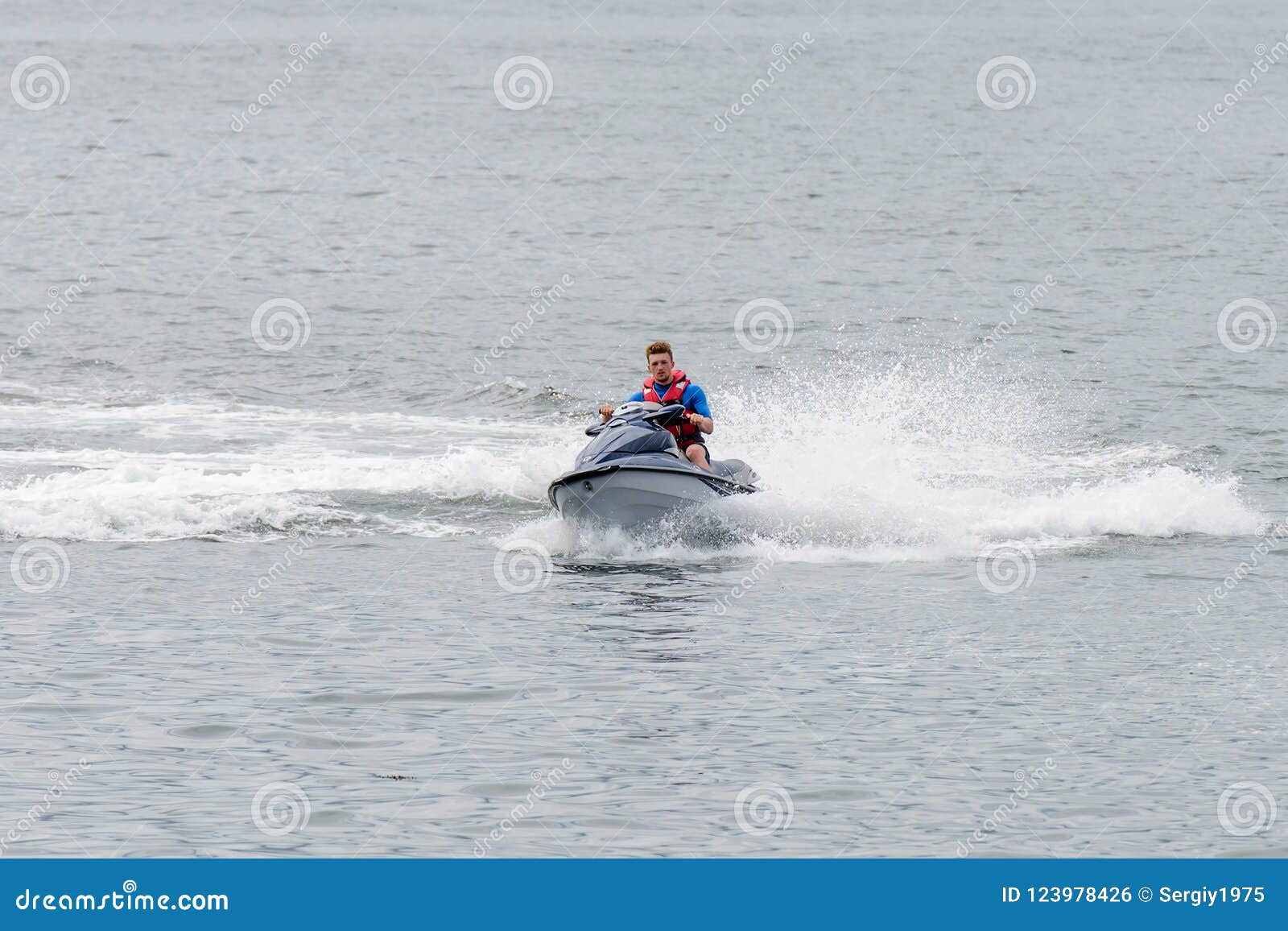 Man riding a jet ski stock photo. Image of outdoor, recreation - 123978426