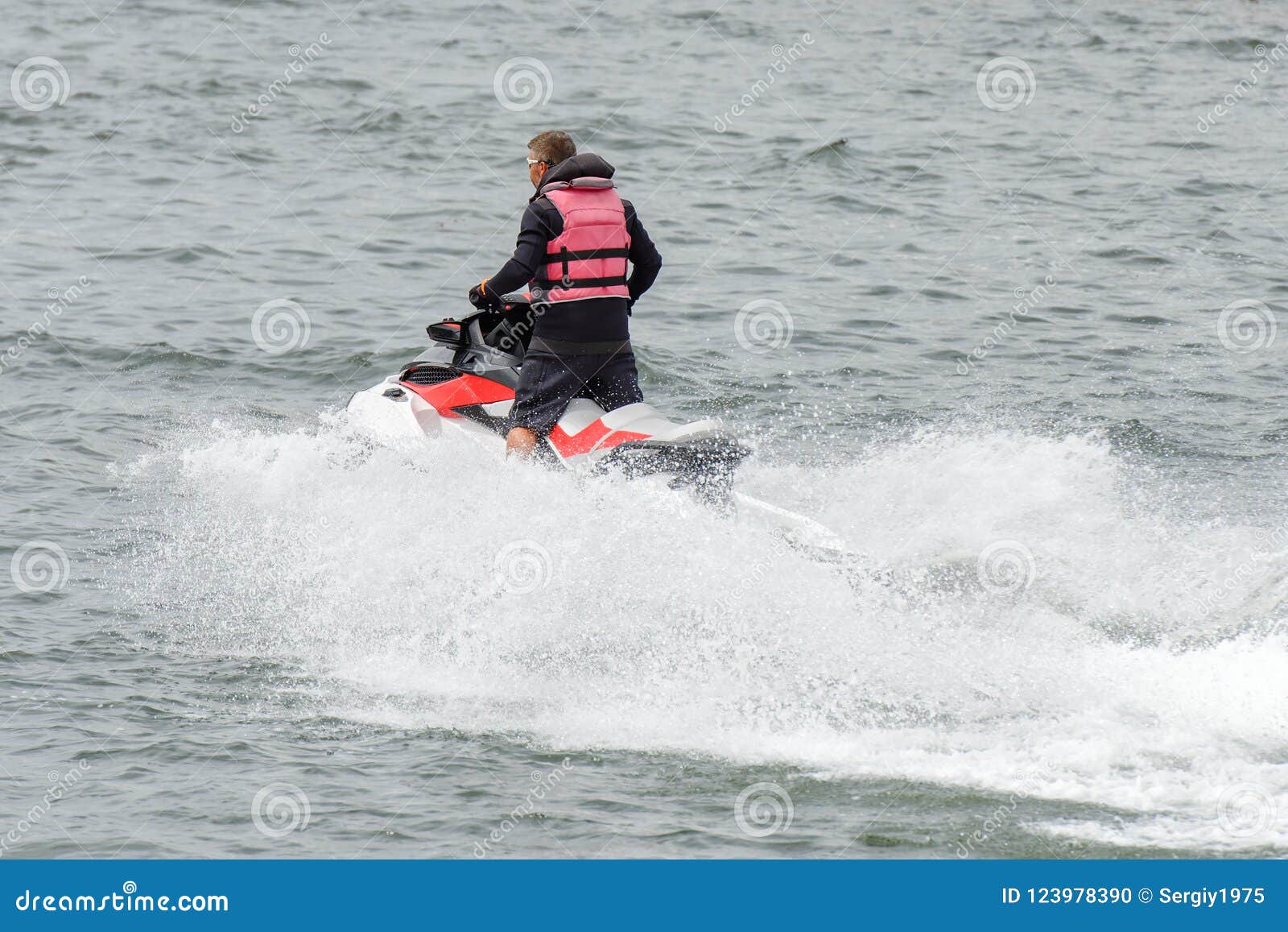 Man riding a jet ski stock photo. Image of riding, recreation - 123978390