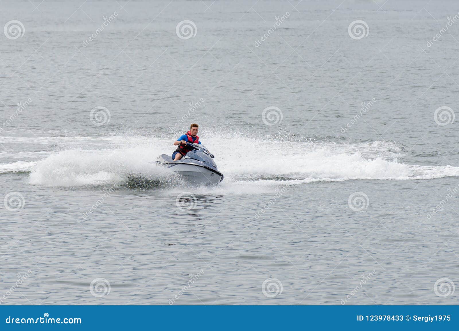 Man riding a jet ski stock image. Image of action, ride - 123978433