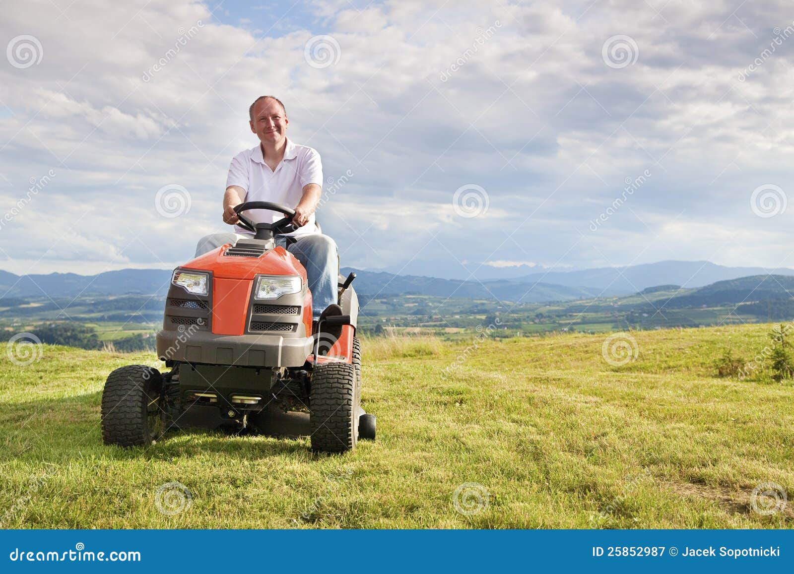 Man riding a lawn tractor stock image. Image of service - 25852987