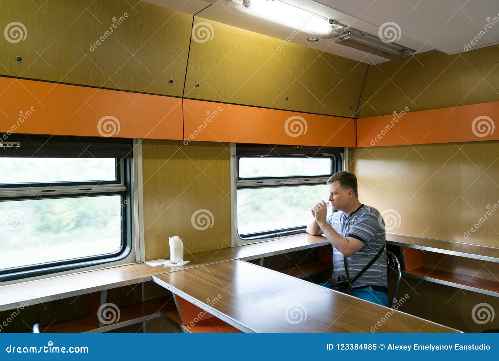 A Man is Riding in a Train Restaurant. Stock Image - Image of railway ...