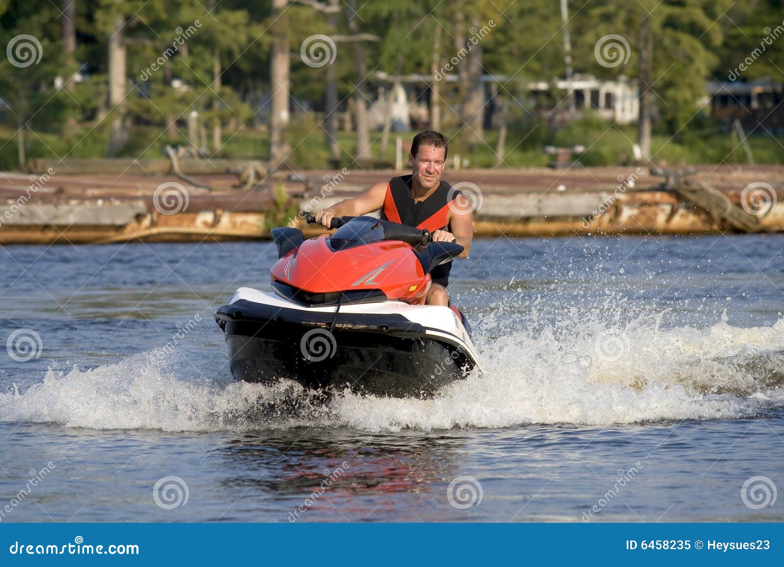 Man riding wave runner stock image. Image of blur, leisure - 6458235