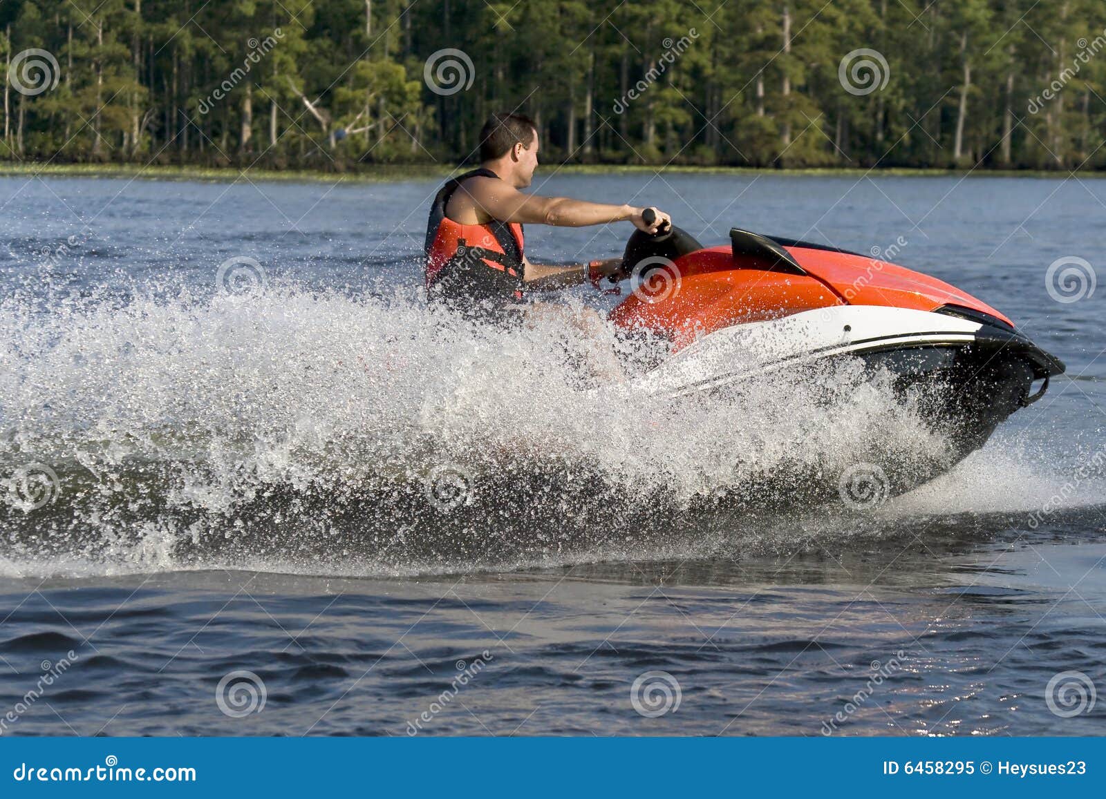 Man riding wave runner stock image. Image of pond, black - 6458295
