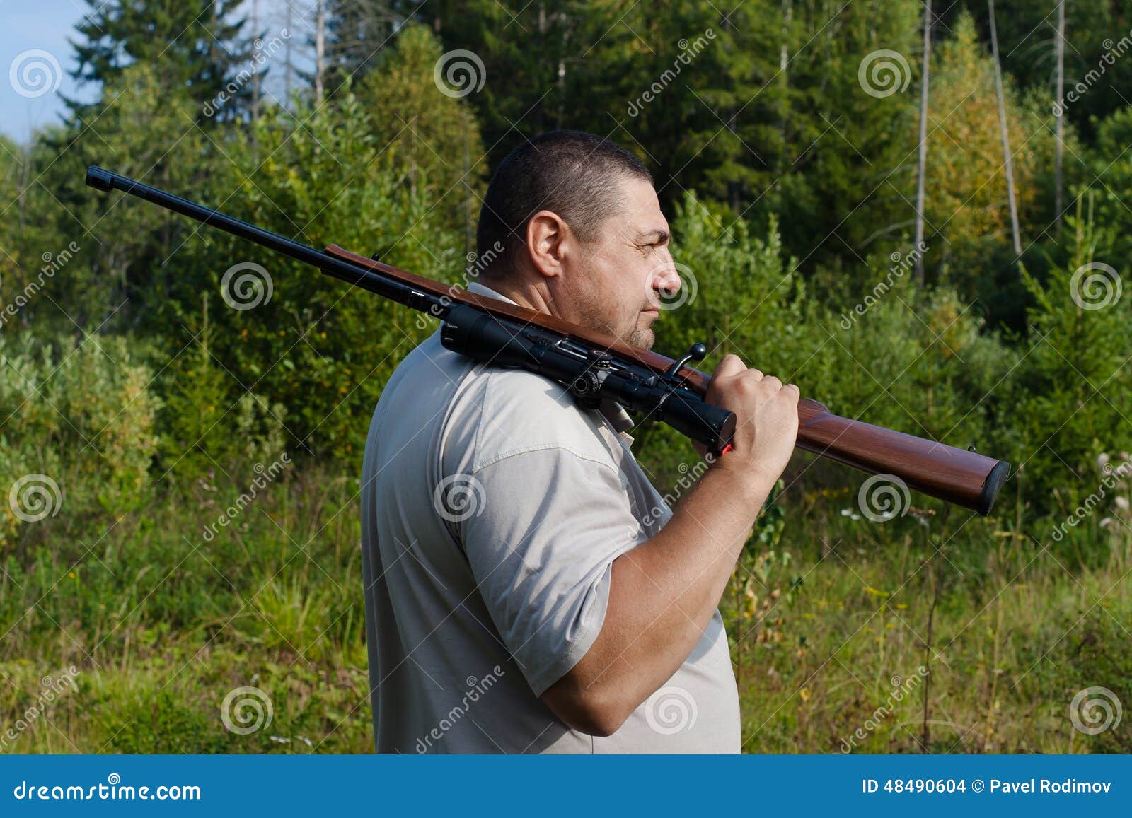 The man with a rifle stock photo. Image of adults, people - 48490604